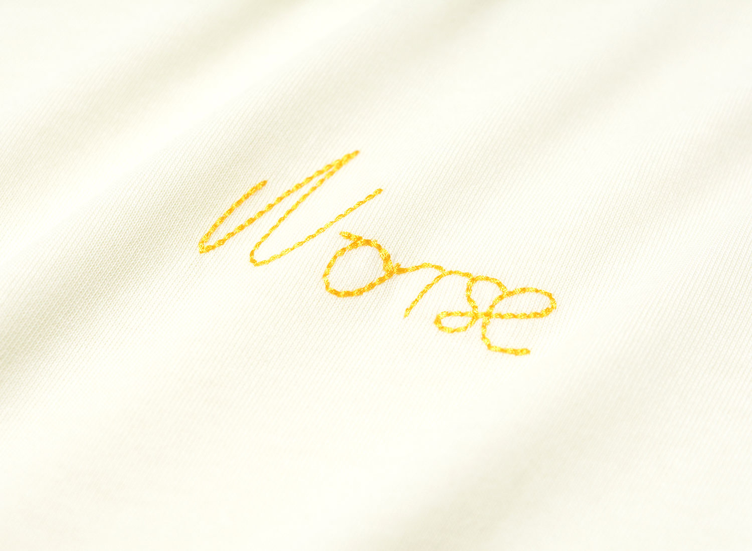 NORSE PROJECTS JOHANNES CHAIN STITCH LOGO ECRU